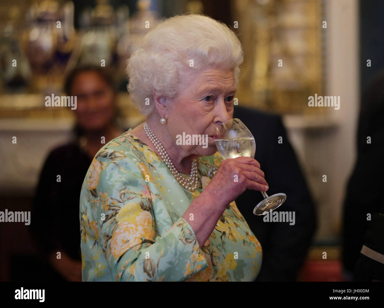 Queen Elizabeth II attend a reception for winners of The Queen's Awards ...