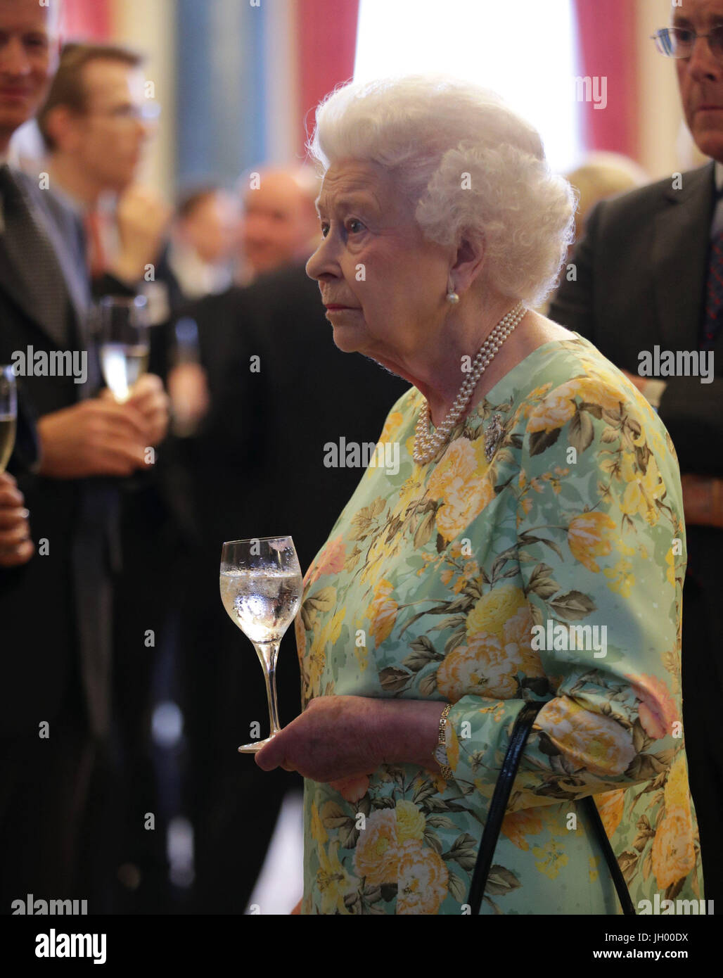 Queen Elizabeth II attend a reception for winners of The Queen's Awards ...
