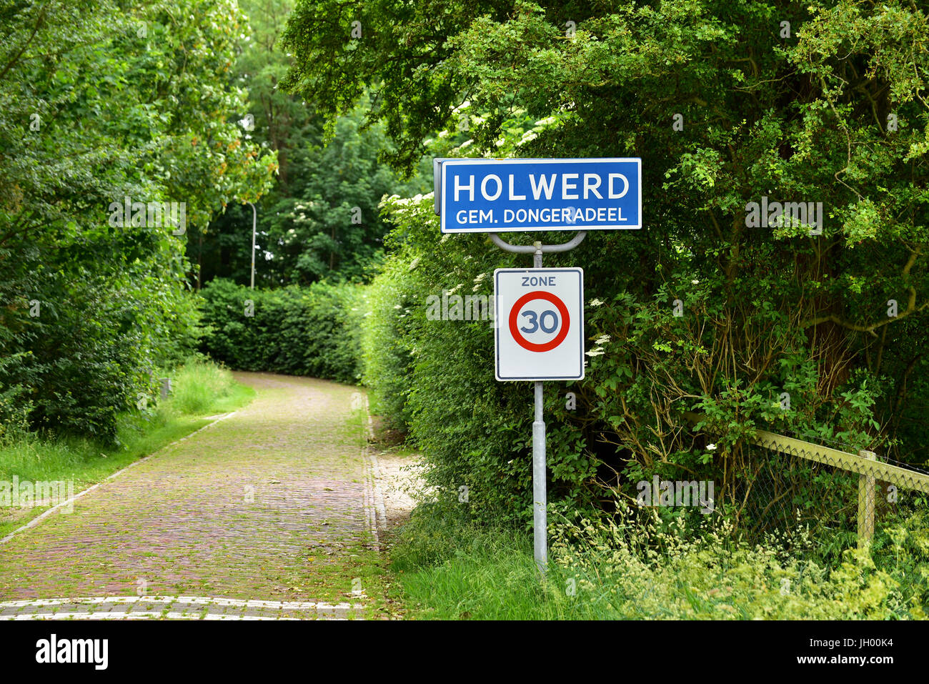 Place name sign of Holwerd Stock Photo - Alamy