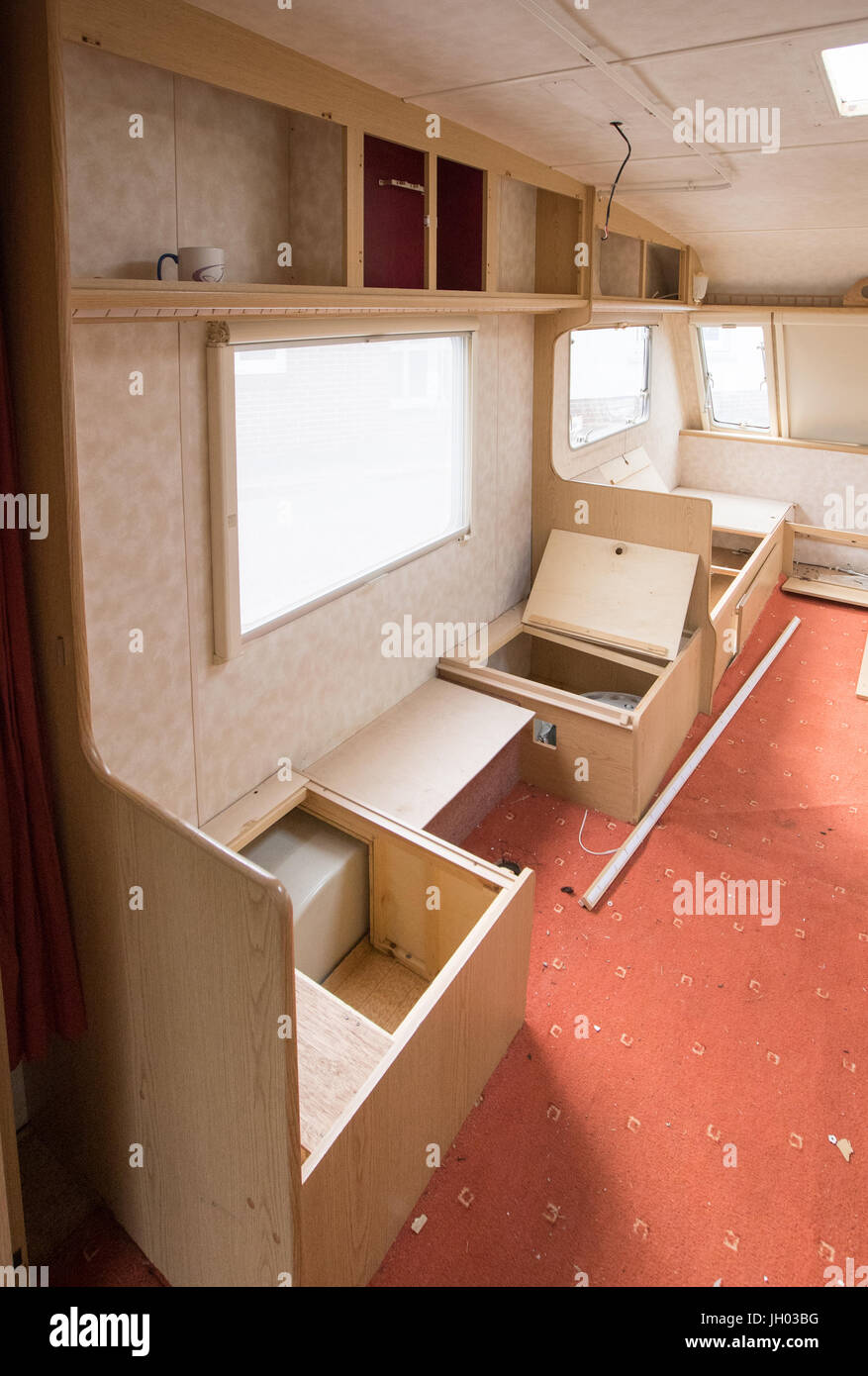 Vertical shot of a caravan conversion project, showing the bare ...