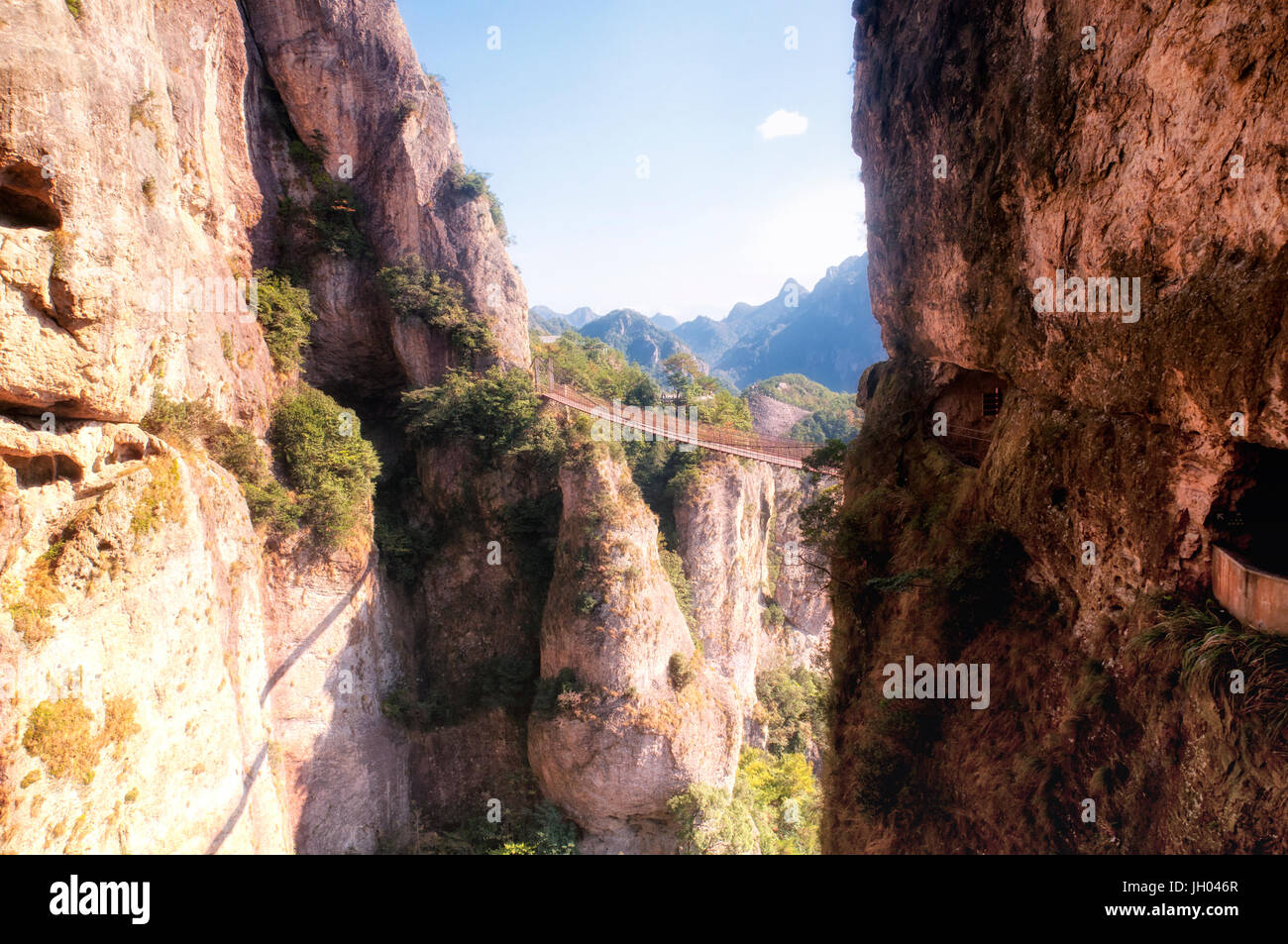The suspension bridge at Fangdong Scenic Area in Yandangshan mountains ...