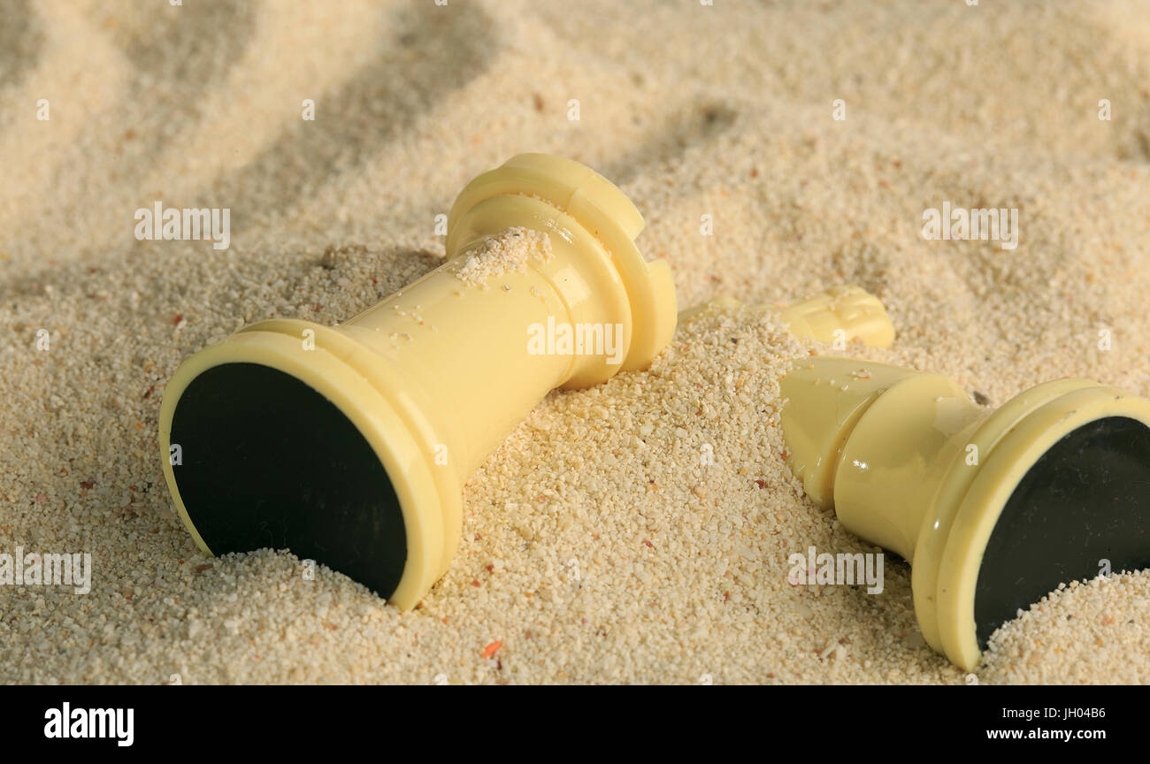 Chess pieces in a sand dune Stock Photo - Alamy
