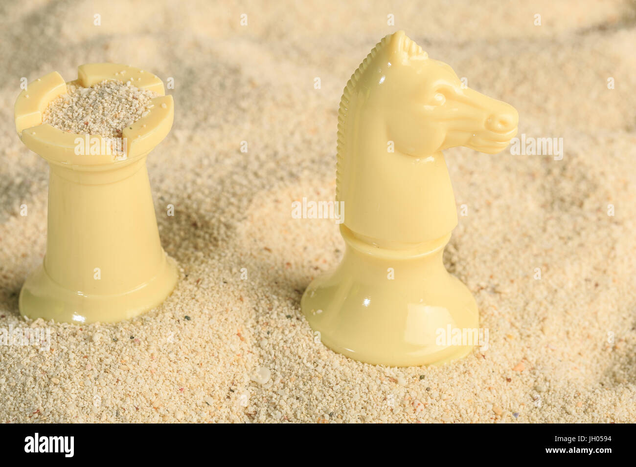 Chess pieces in a sand dune Stock Photo - Alamy