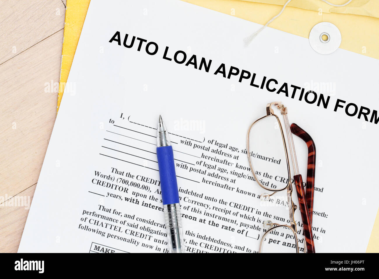 auto loan application form with manila envelop and pen Stock Photo - Alamy