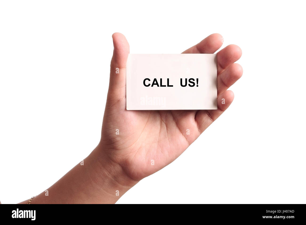 Call us card in the hand of a woman in a white background Stock Photo ...