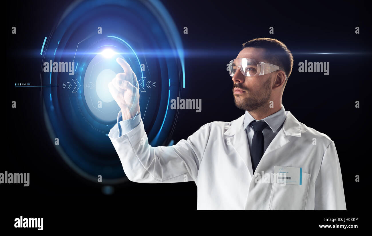 scientist in goggles with virtual projection Stock Photo - Alamy