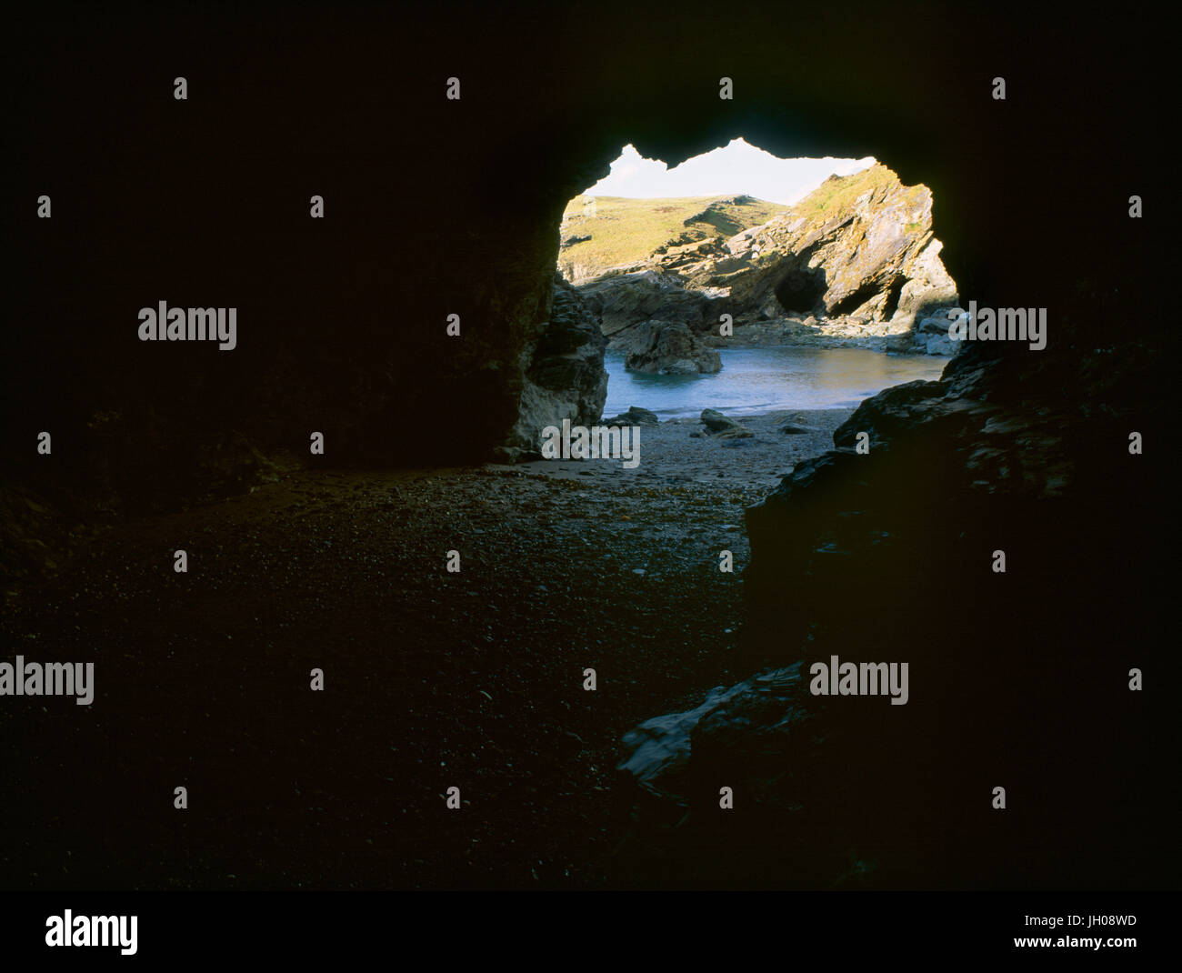 Looking north eastwards out of Merlin's Cave to Tintagel Cove at low ...
