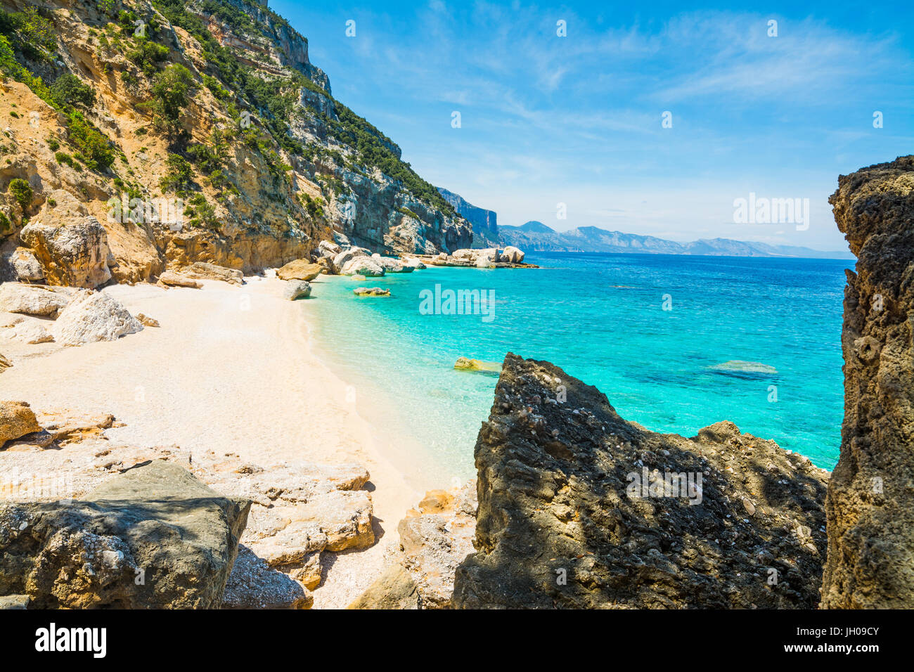 rocks in Cala Mariolu beach Stock Photo - Alamy