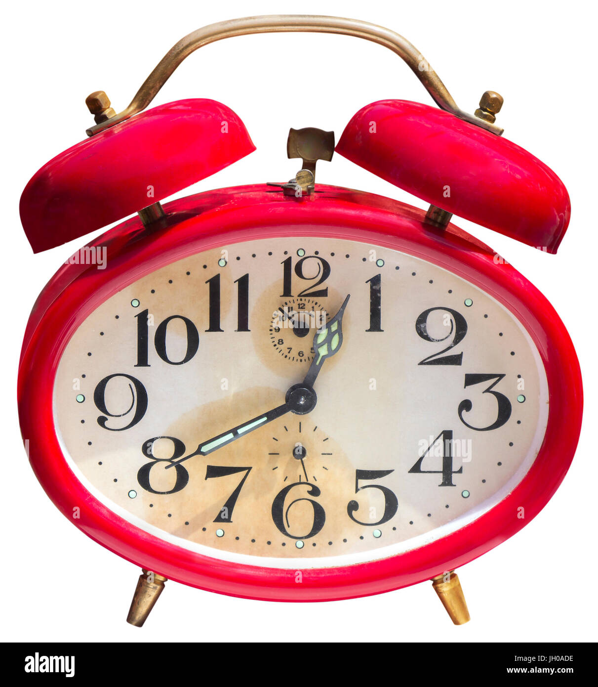 Old red alarm clock isolated on white background Stock Photo - Alamy