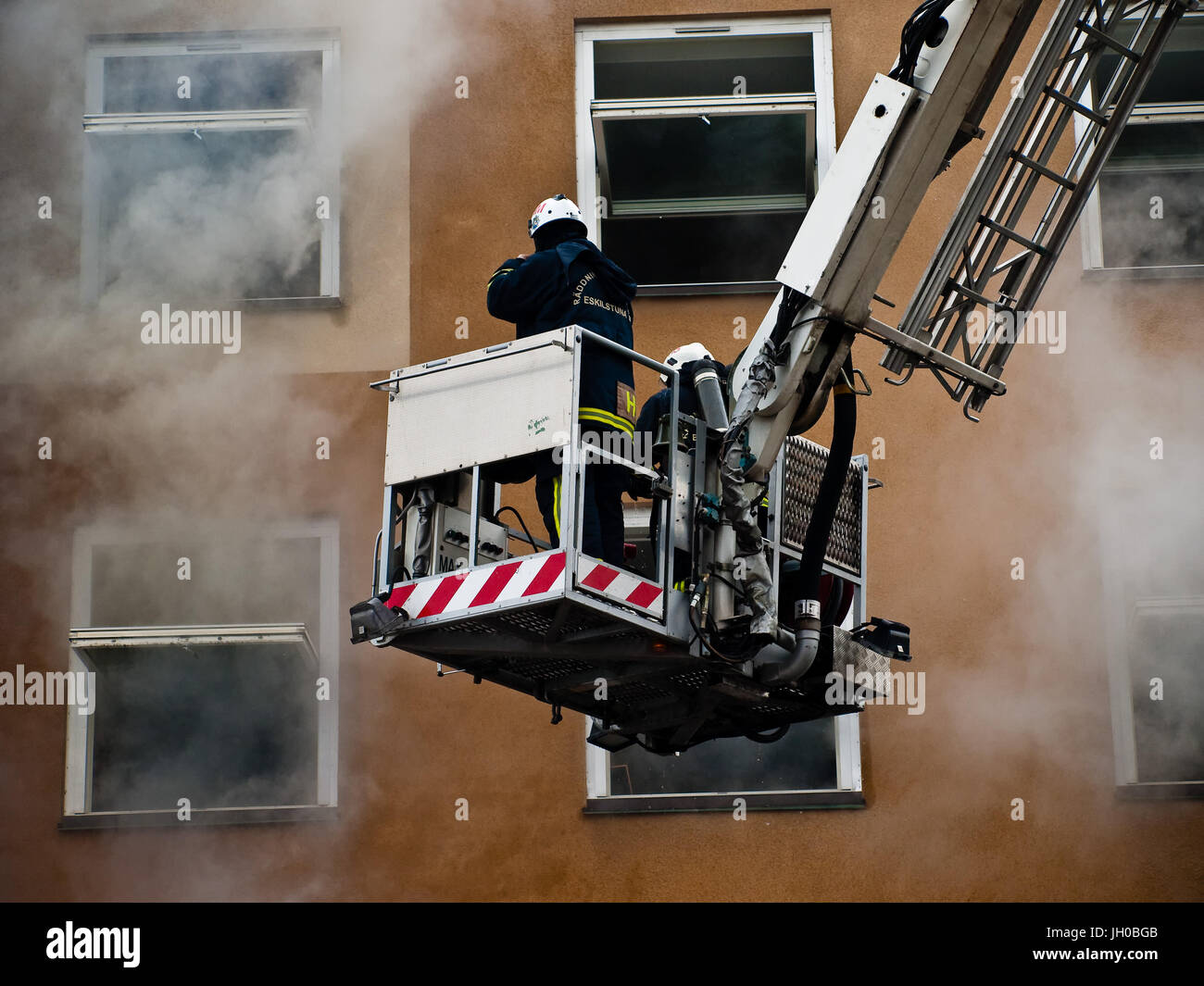 Fireman lift hi-res stock photography and images - Alamy