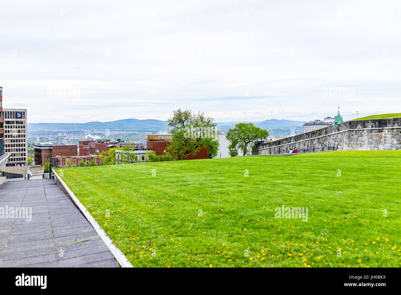 Grass field cloudy city street hi-res stock photography and images - Alamy