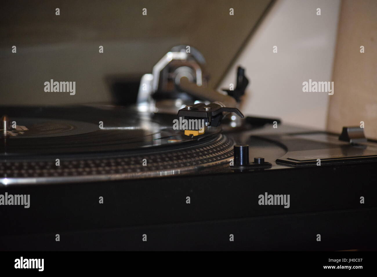 Needle on a disc Stock Photo - Alamy