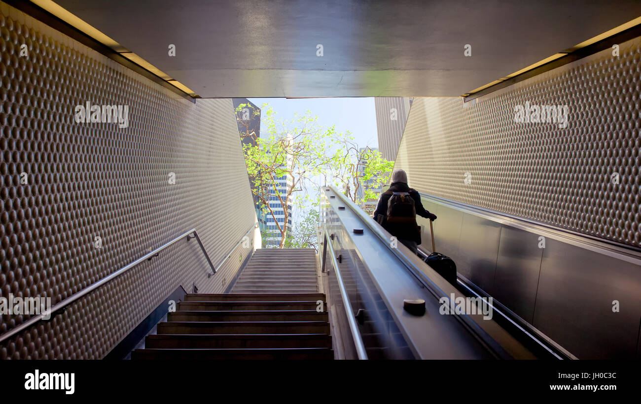 business man raising stairs to reach the city Stock Photo - Alamy