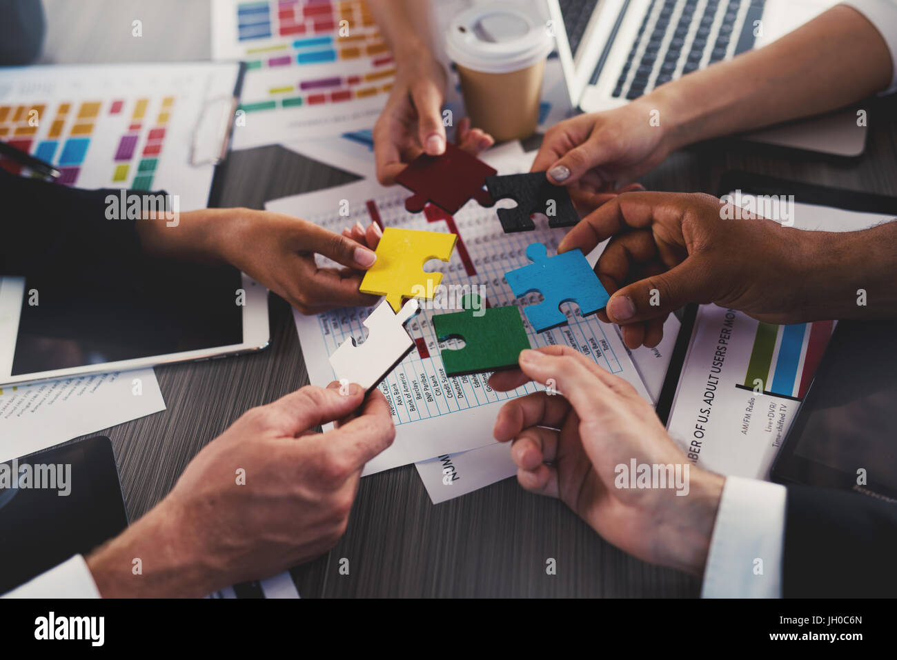 Team work puzzles hi-res stock photography and images - Alamy