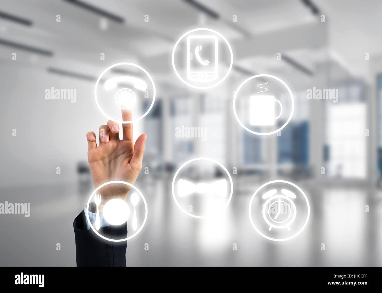 Modern office interior and close of businesswoman hand choosing symbol ...
