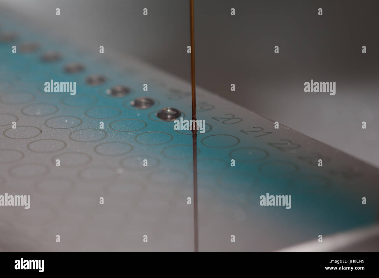 Pipetting of MALDI-TOF target in laboratory, mass-spectrometry Stock ...