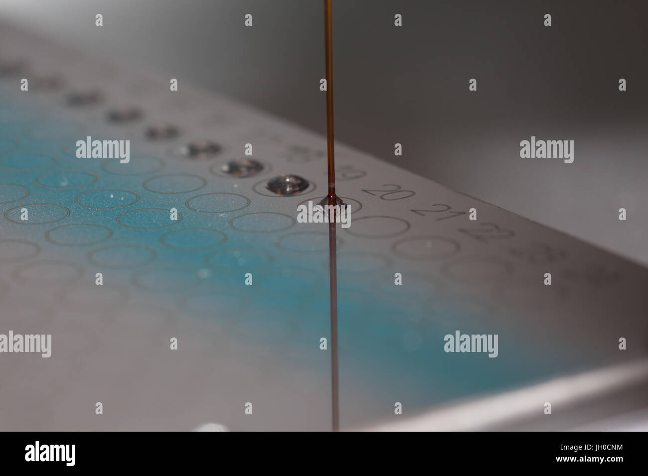 Pipetting of MALDI-TOF target in laboratory, mass-spectrometry Stock ...