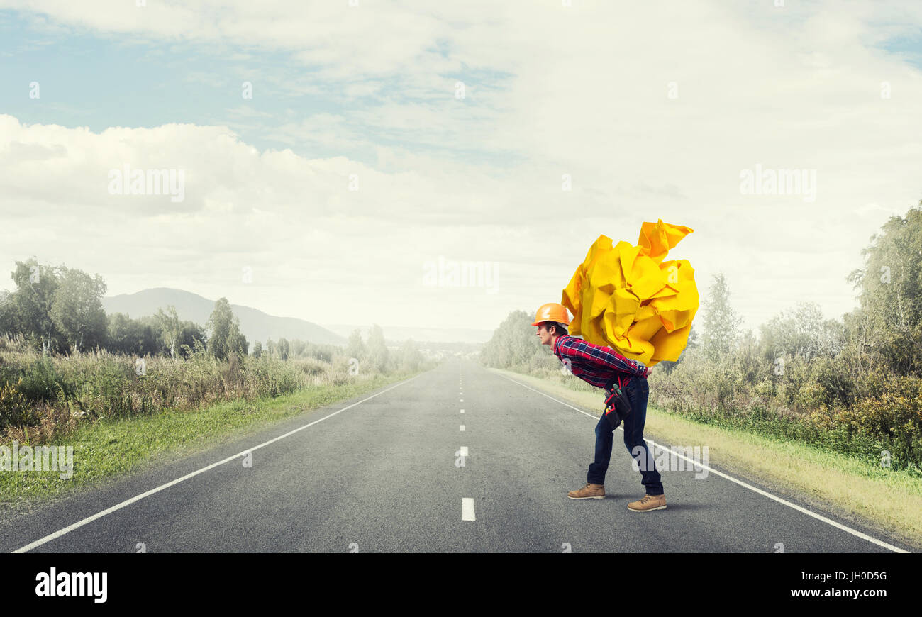 Engineer man carry load Stock Photo - Alamy