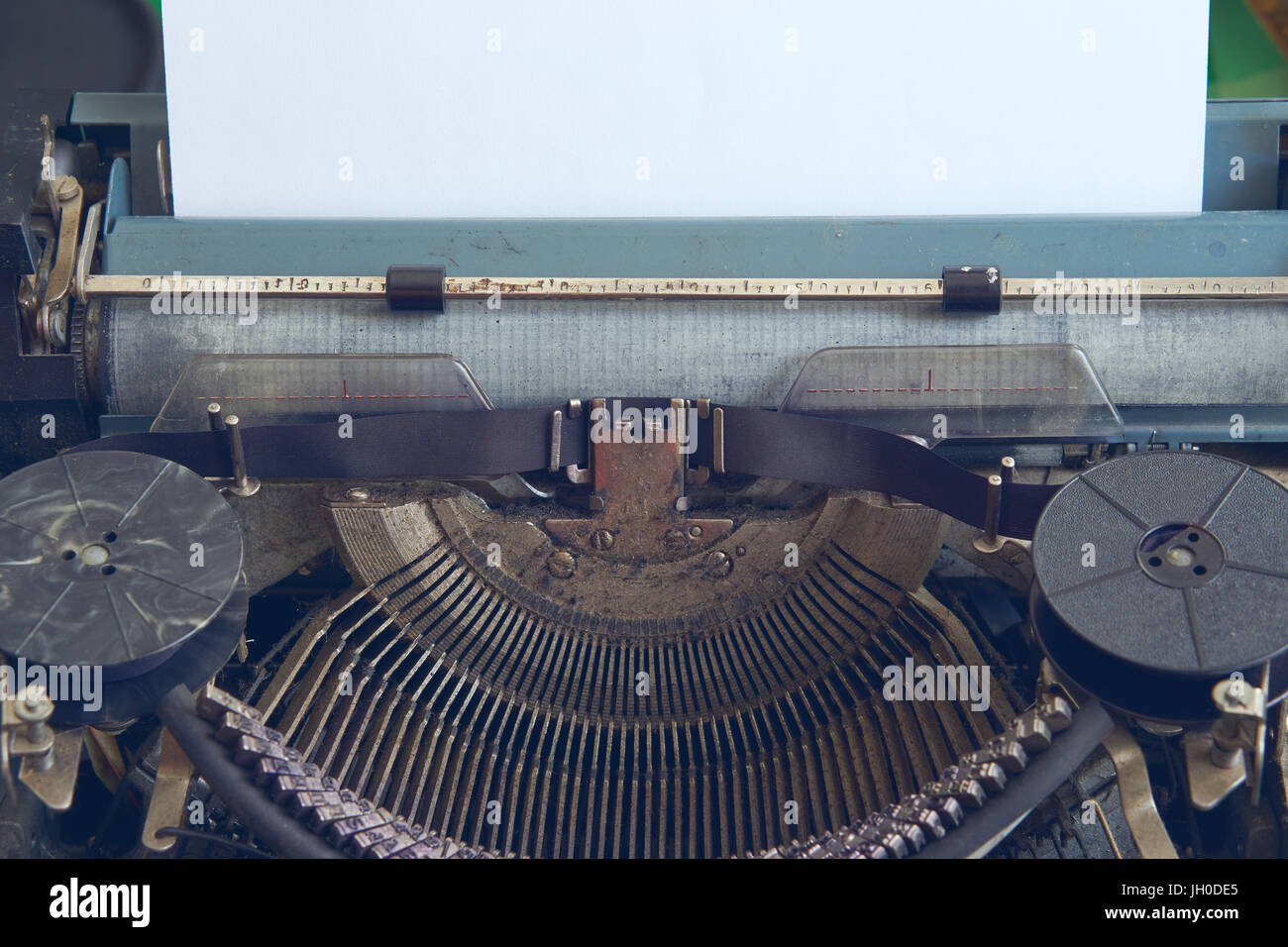 antique retro vintage typewriter with ribbon and carriage with inserted ...