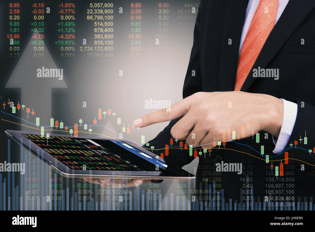 business man Trading concept using the tablet with financial graph on ...
