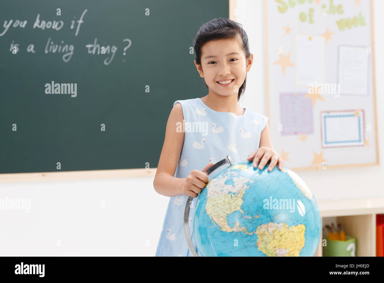 Primary school girls in the classroom Stock Photo - Alamy