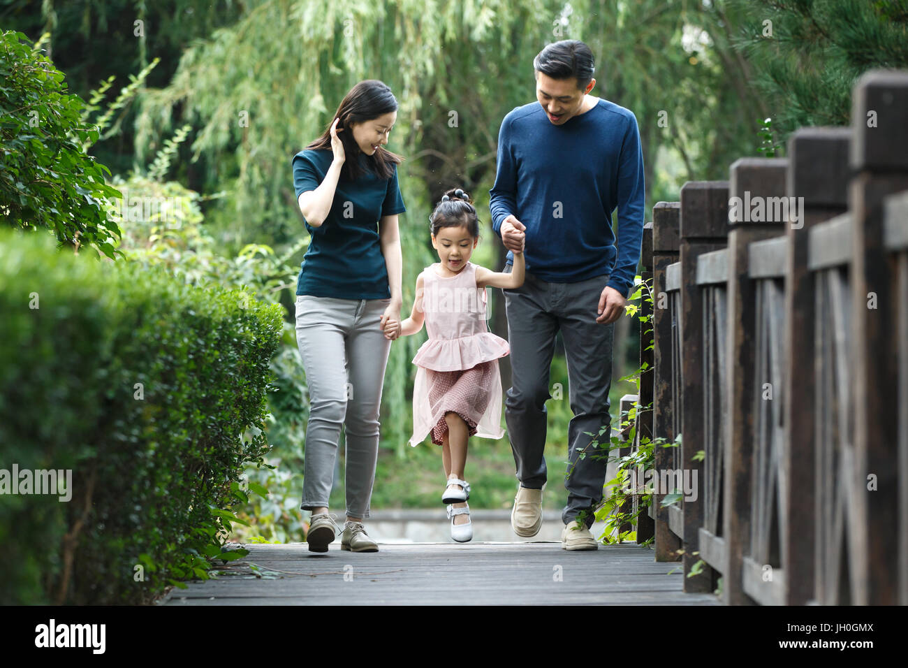 Happy family on walking Stock Photo - Alamy