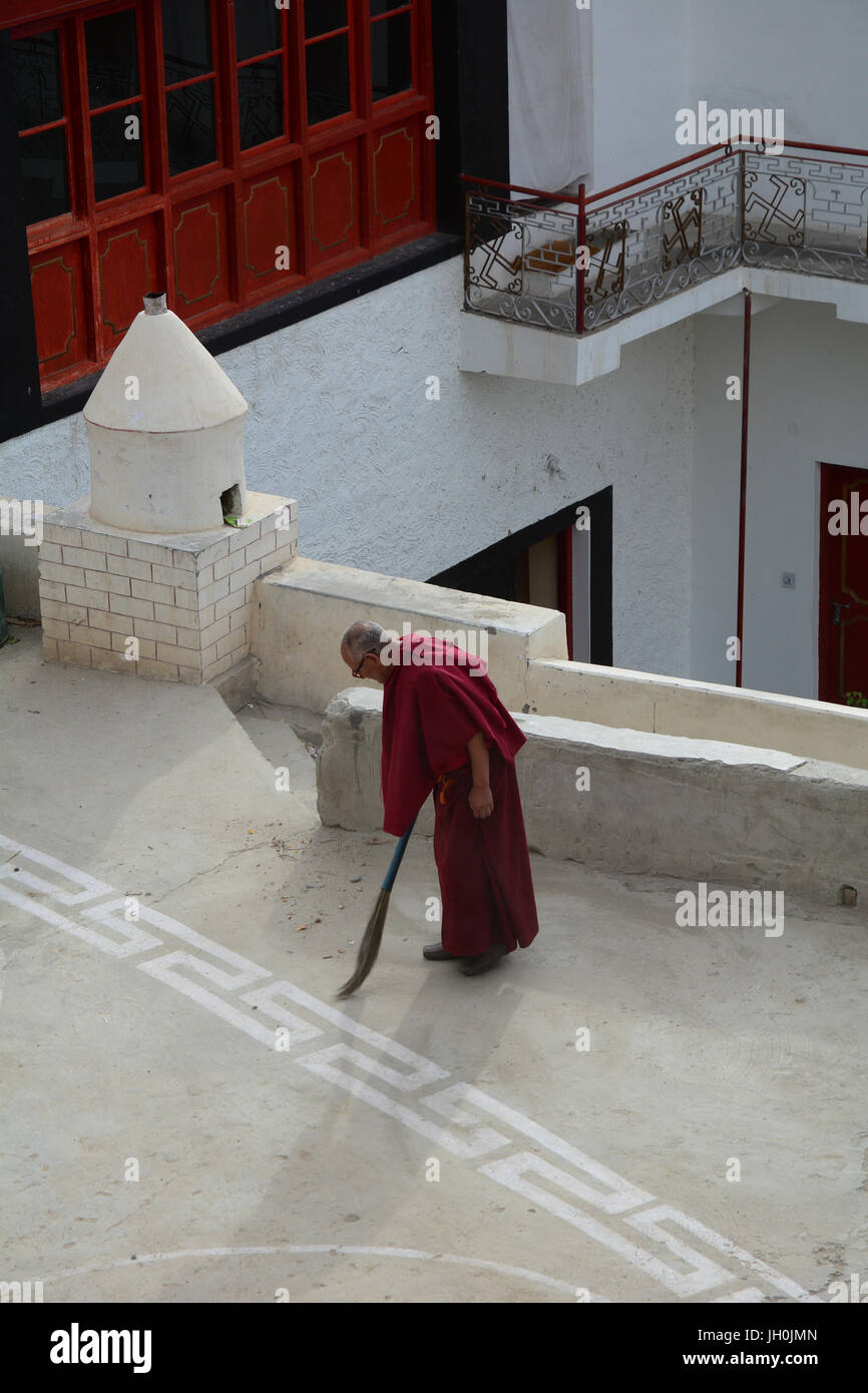 Ladakh, India - Jul 17, 2015. A Tibetan monk working at the monastery ...