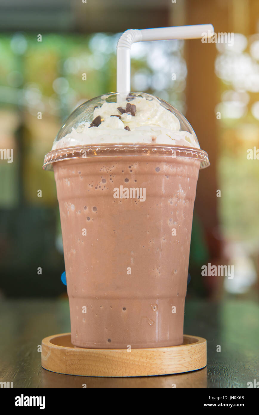 Chocolate smoothie or Chocolate frappe and whipping cream topping in ...