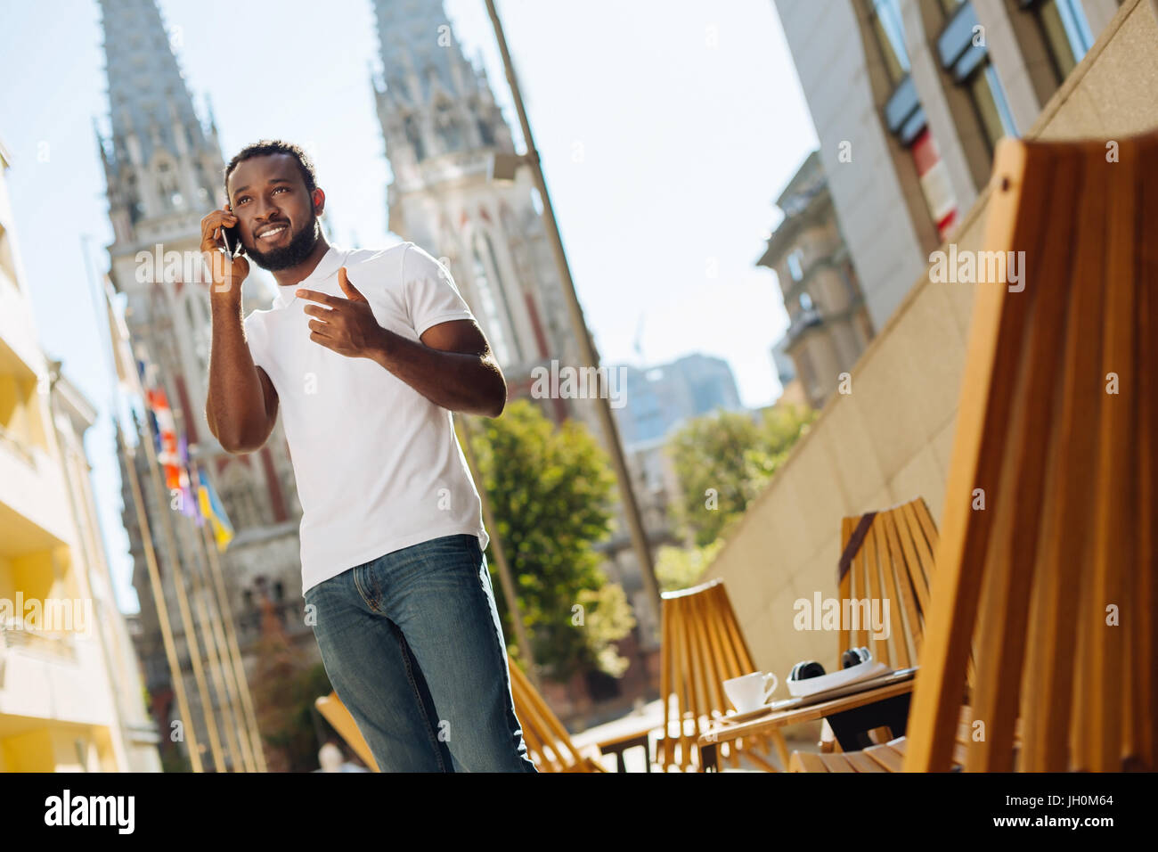 Brilliant ambitious man discussing his project Stock Photo - Alamy