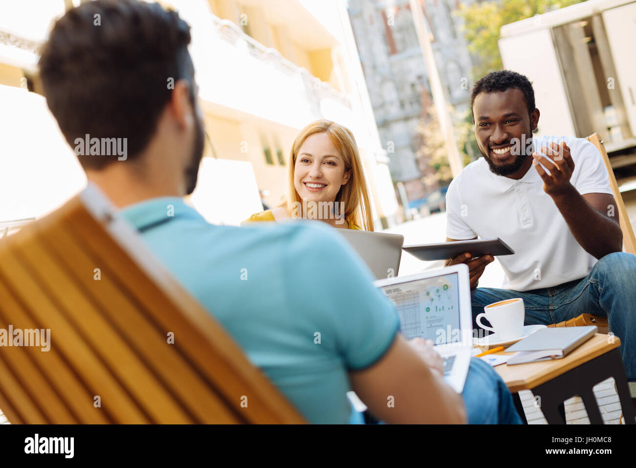 Cheerful ambitious people having a business meeting Stock Photo - Alamy
