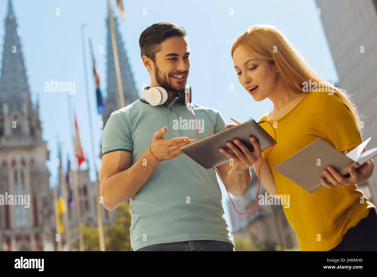 Young charming woman excited about friends business idea Stock Photo ...