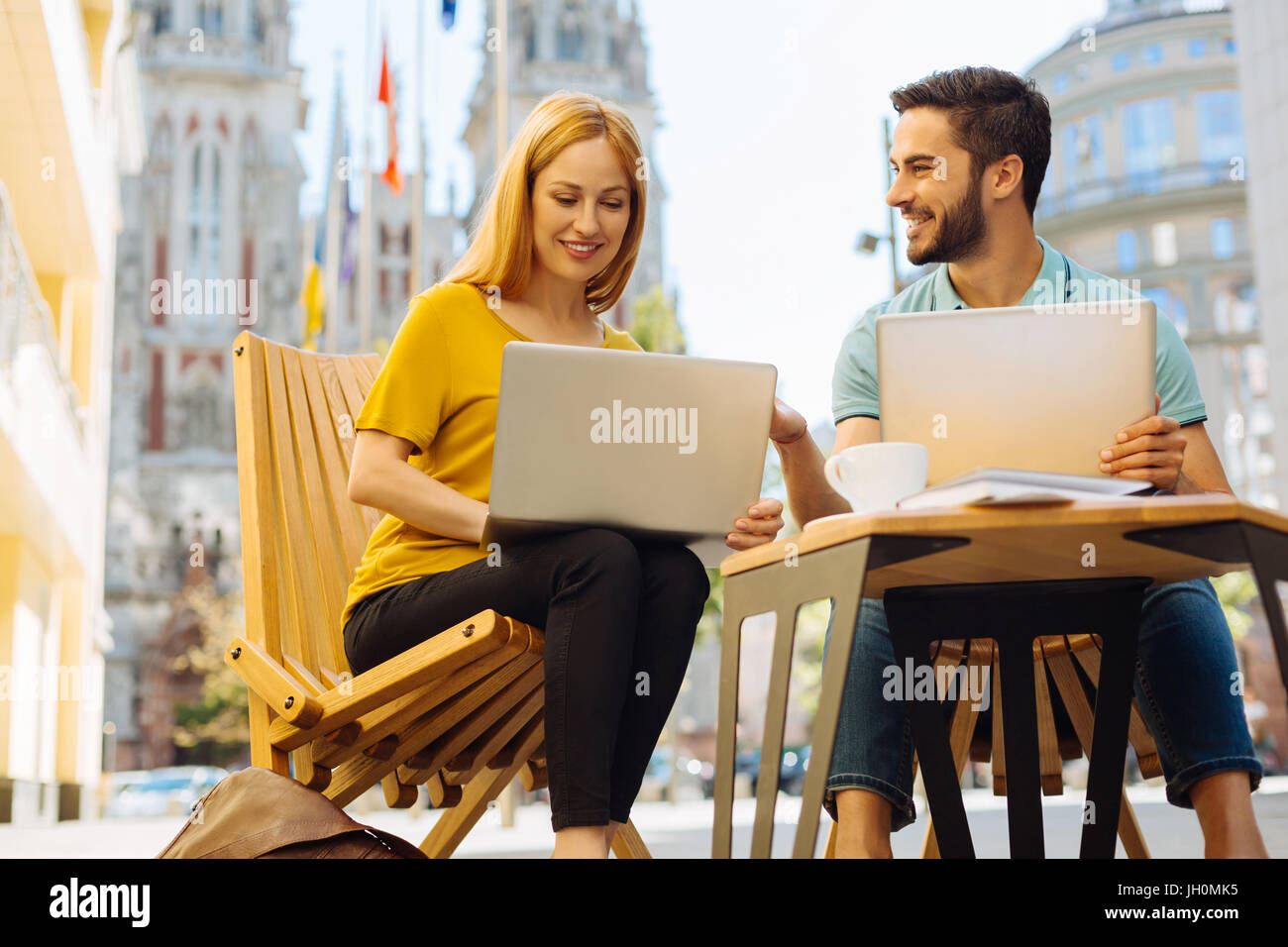 Talented optimistic entrepreneurs developing strategic plan for their ...