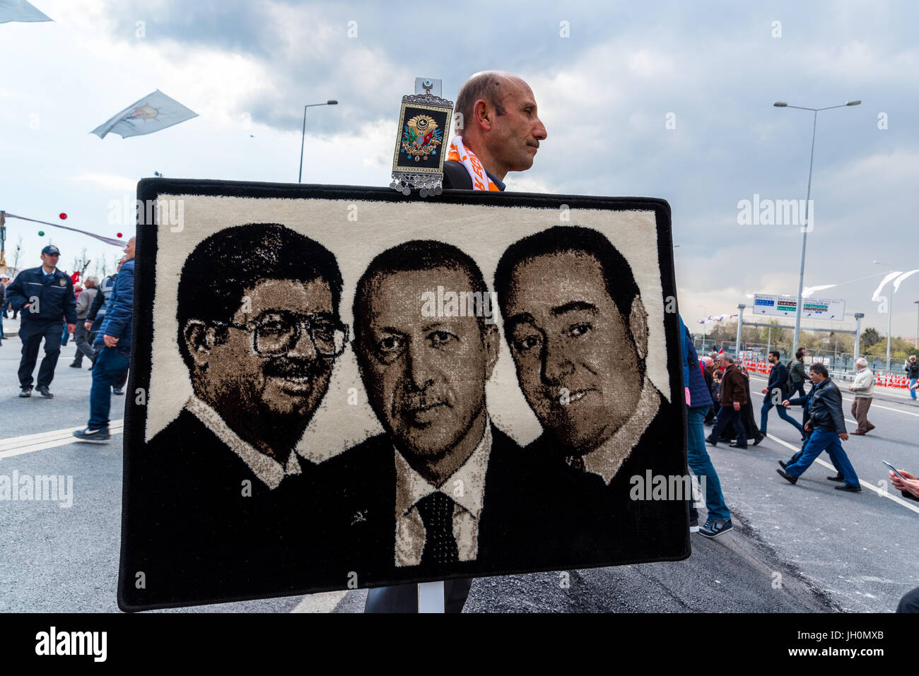 AKP (Justice and Development Party) supporters shout slogans and wave ...