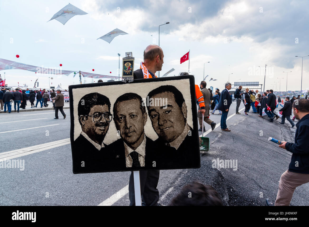 AKP (Justice and Development Party) supporters shout slogans and wave ...