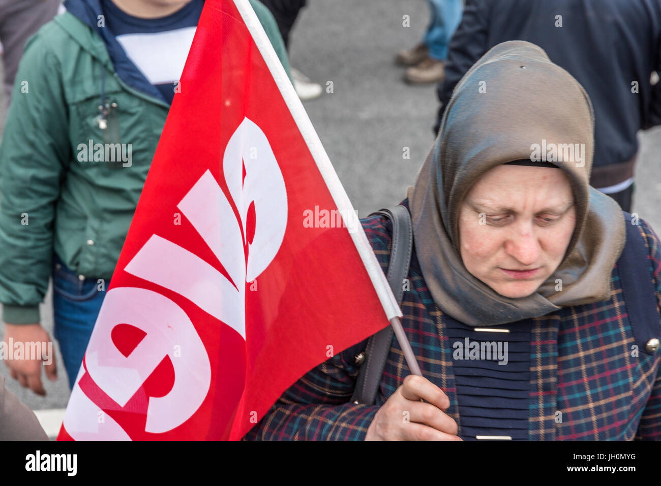 AKP (Justice and Development Party) supporters shout slogans and wave ...