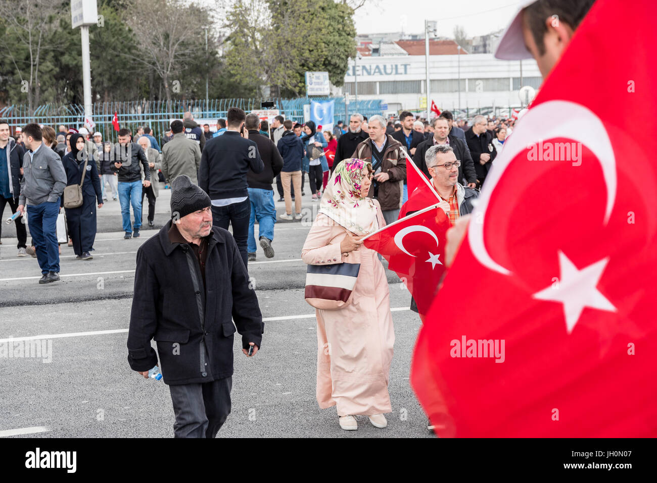 AKP (Justice and Development Party) supporters shout slogans and wave ...