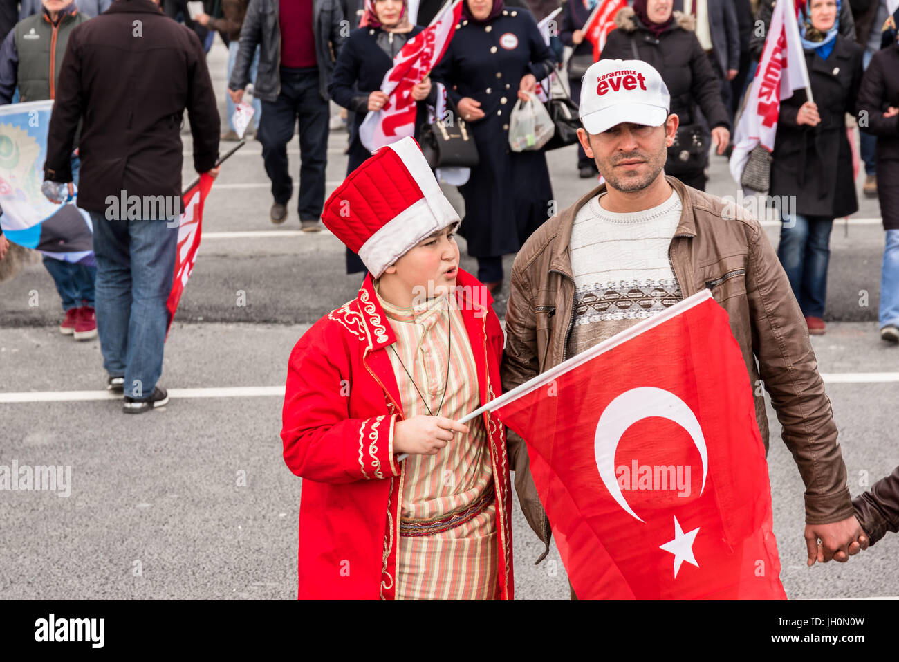 AKP (Justice and Development Party) supporters shout slogans and wave ...
