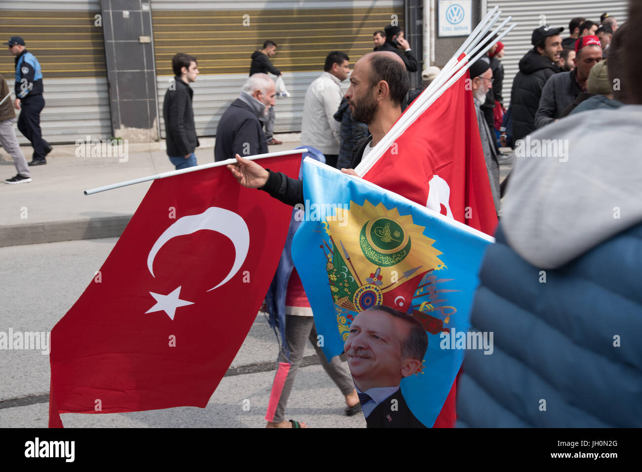 AKP (Justice and Development Party) supporters shout slogans and wave ...