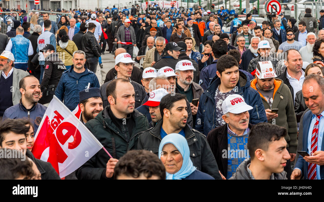 AKP (Justice and Development Party) supporters shout slogans and wave ...