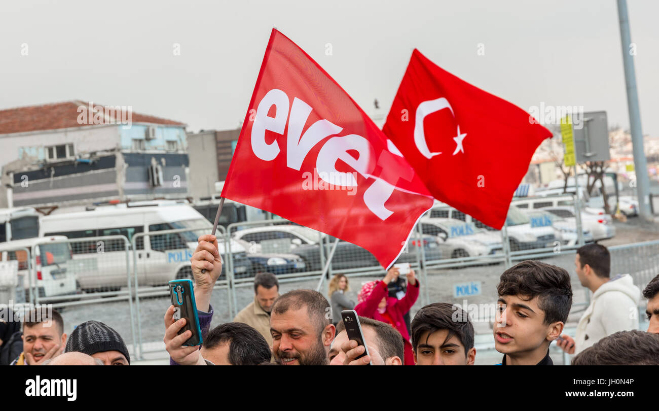 AKP (Justice and Development Party) supporters shout slogans and wave ...