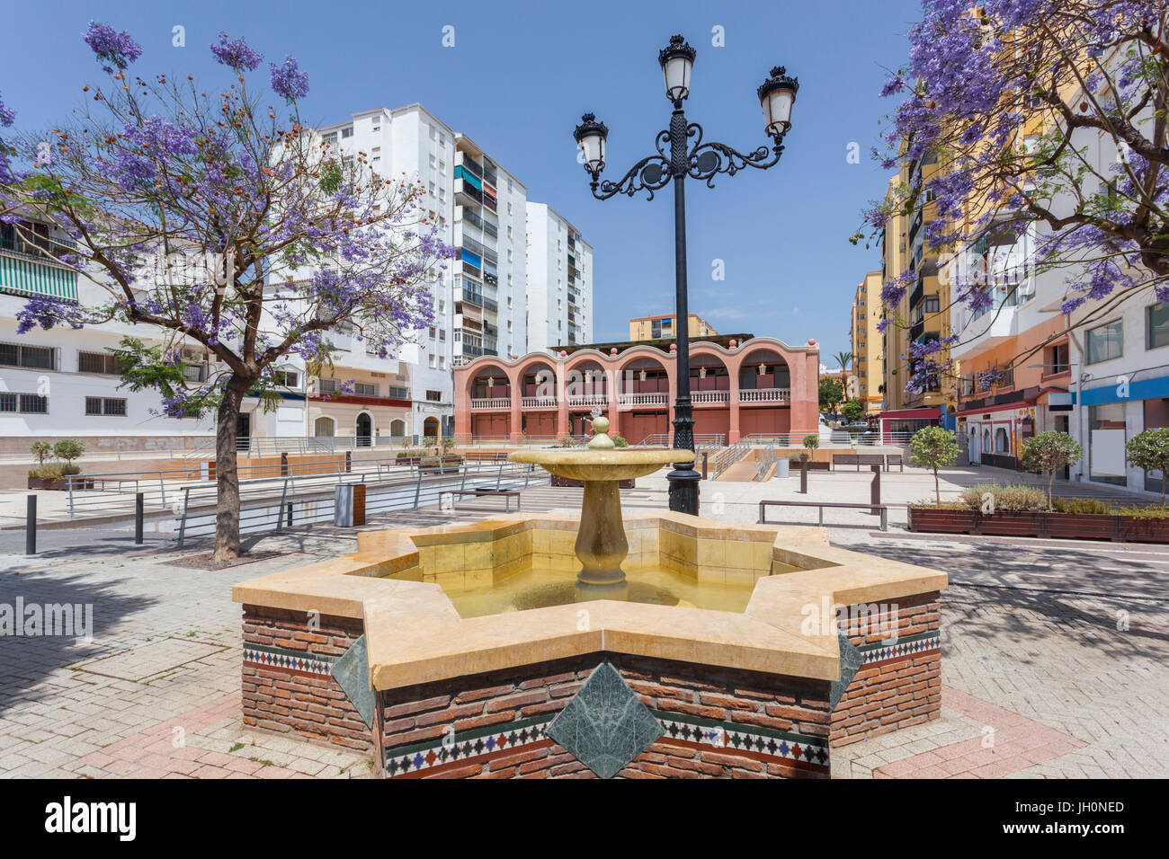Market square with fountain in the city of San Pedro de Alcantara ...