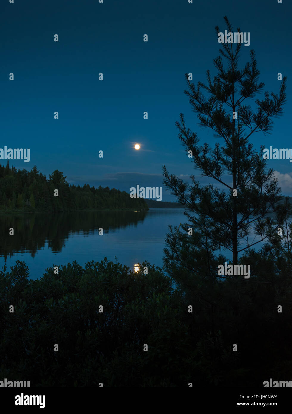 Evening at the lake Stock Photo - Alamy