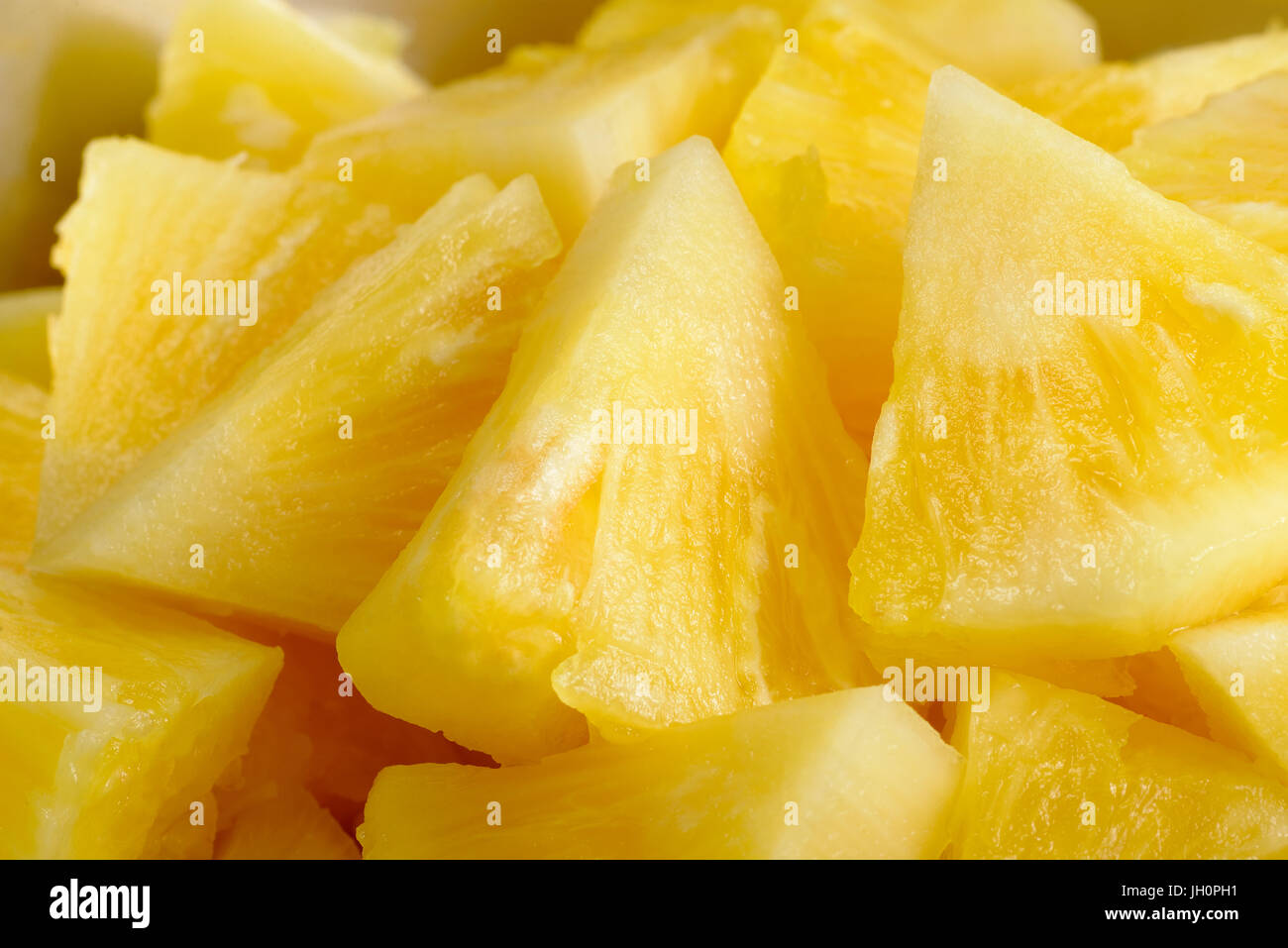 Close up slice pineapple background texture Stock Photo - Alamy