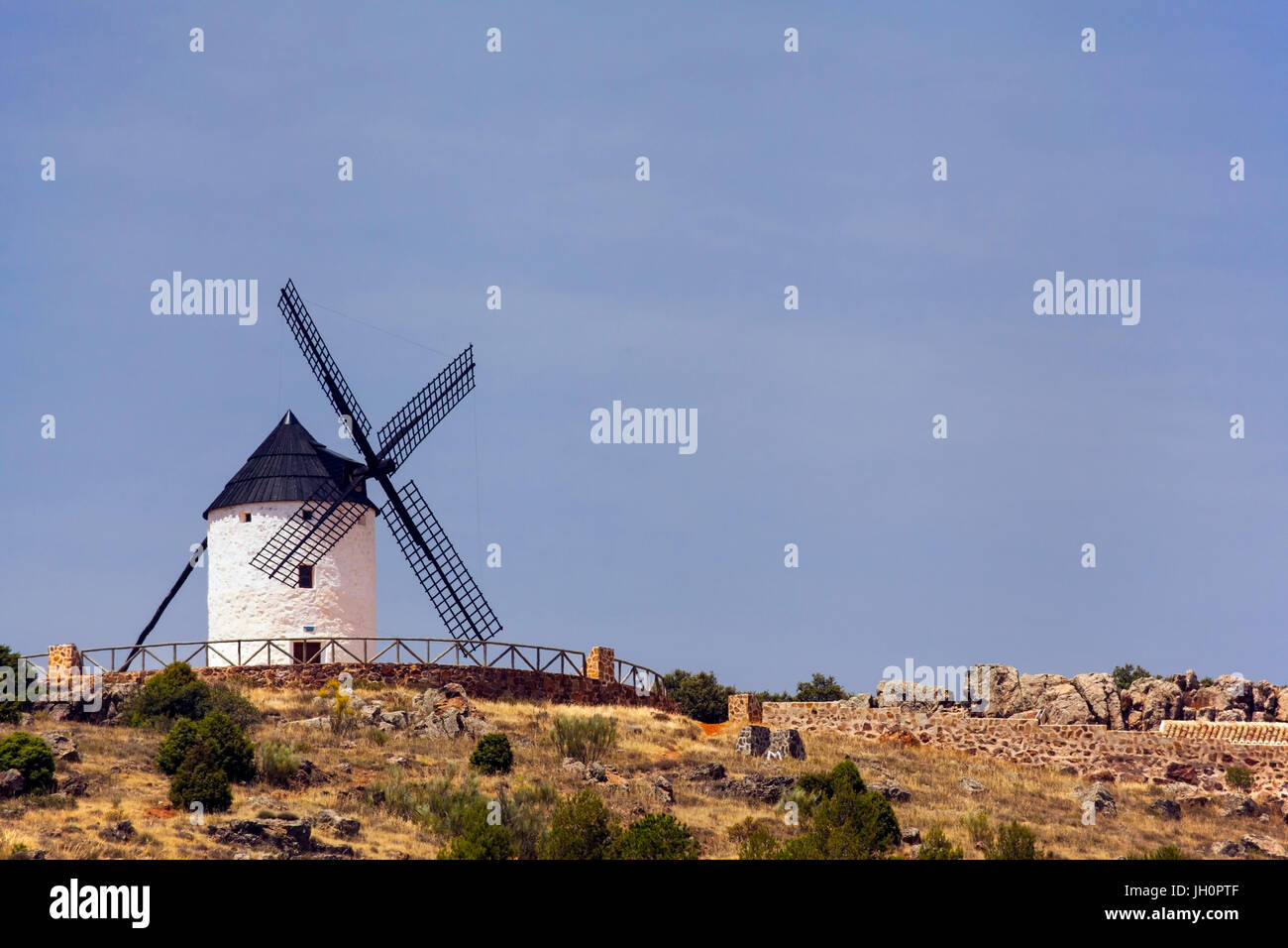 Windmills above the plains of La Mancha in the Castilla-La-Mancha ...