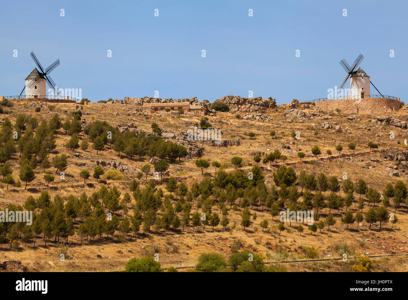 Windmills above the plains of La Mancha in the Castilla-La-Mancha ...