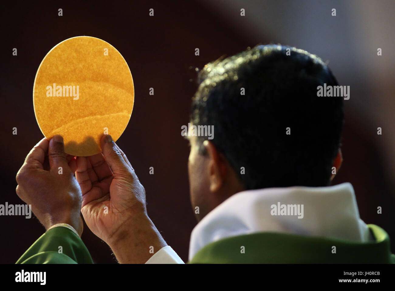 Catholic mass. Eucharist celebration. France Stock Photo - Alamy