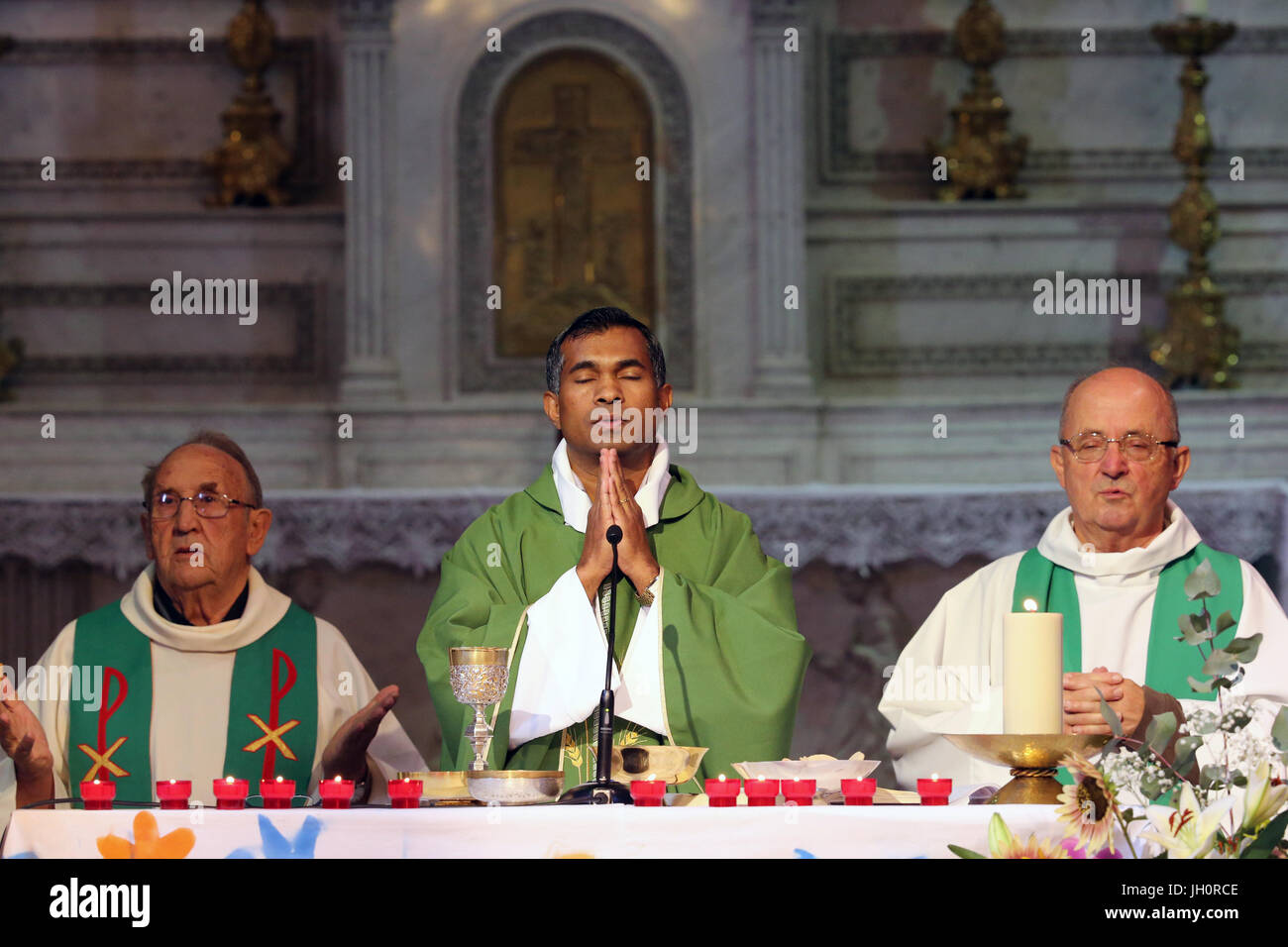 Catholic mass. Eucharist celebration. France Stock Photo - Alamy