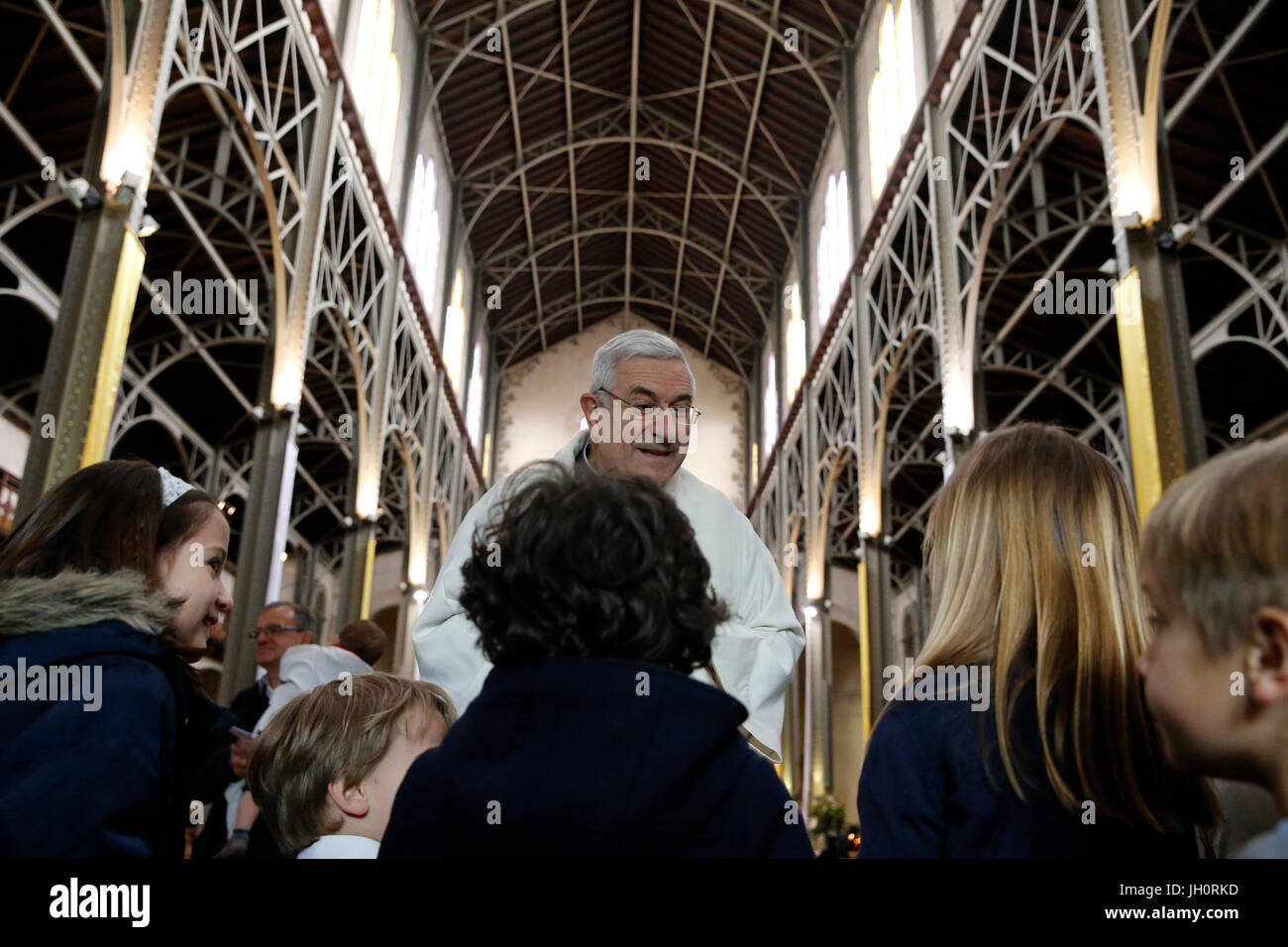 Priest and children hi-res stock photography and images - Alamy