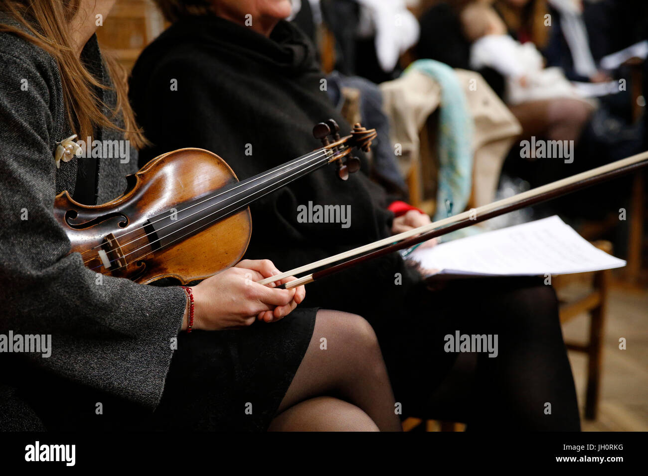 Violin player in a church. France Stock Photo - Alamy