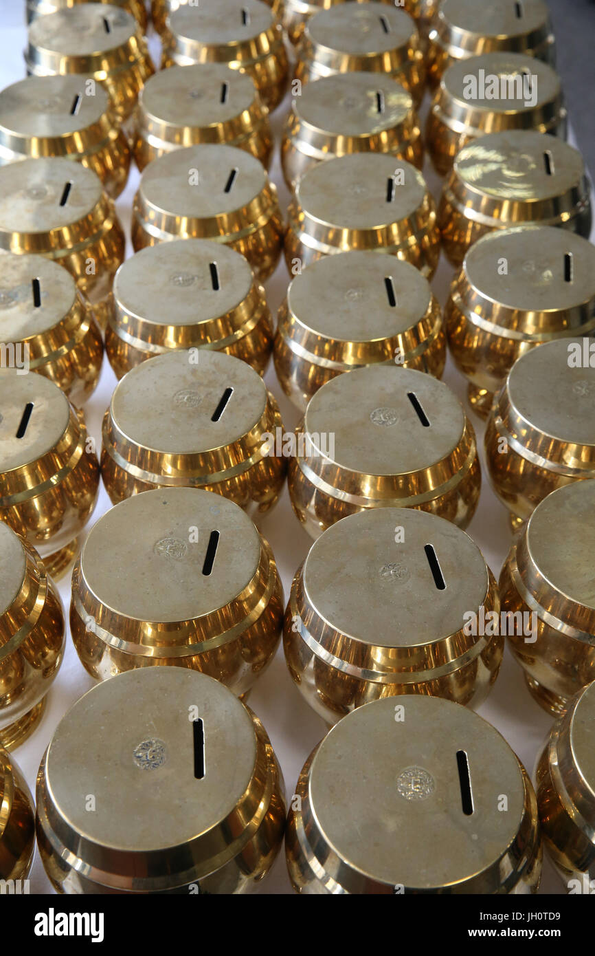 Wat Velouvanaram. Money boxes for offerings. France Stock Photo - Alamy